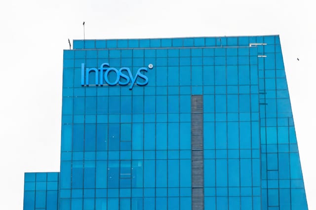 Infosys to hire 20,000 freshers as headcount falls and attrition drops ...